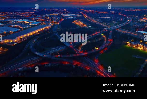Dusk view of illuminated highway ramps with traffic, United States ...