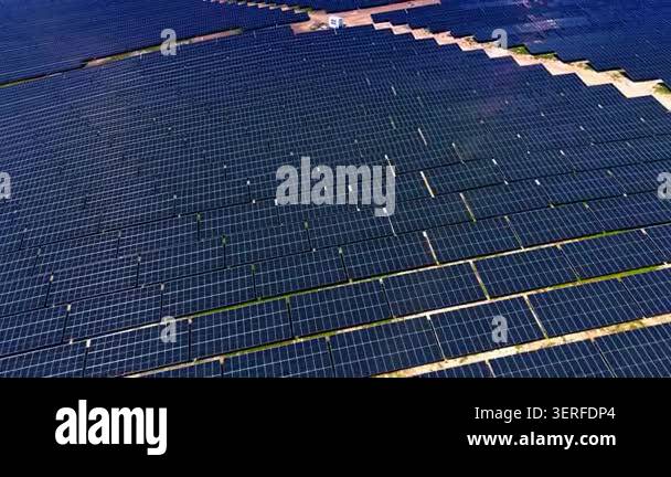 Aerial view of large solar panel array at industrial power plant ...