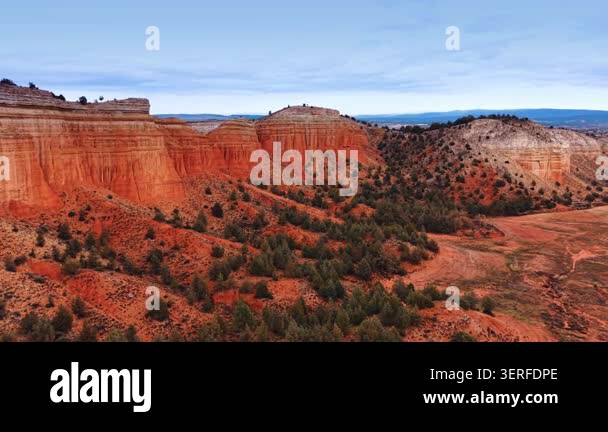 Panoramic view of red rock mesas and green valleys, Spain. Wide angle ...