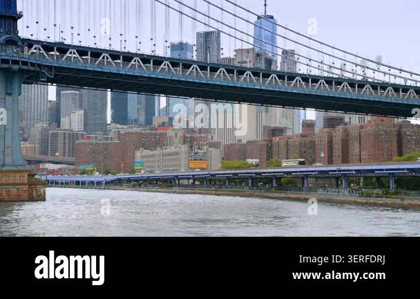 New York, USA, 8 May 2026: Manhattan Bridge spanning over East River ...