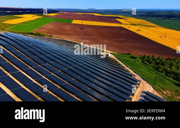 Photovoltaic plant surrounded by colorful agricultural patchwork ...