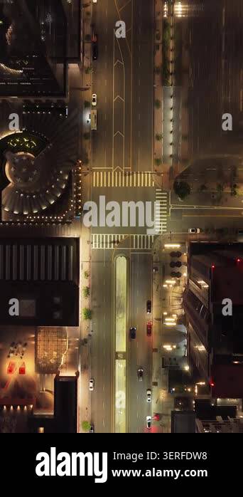 Top down aerial shot flying above downtown Los Angeles city streets ...