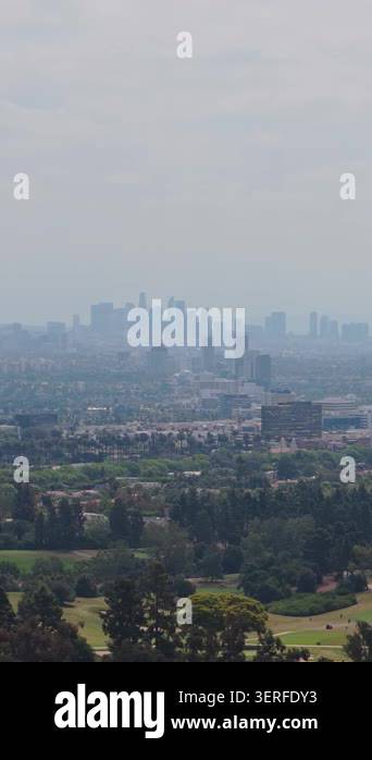 Hazy aerial of downtown Los Angeles urban skyline with Beverly Hills ...