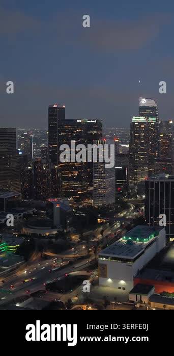 Downtown Los Angeles cityscape illuminating skyscrapers and urban ...