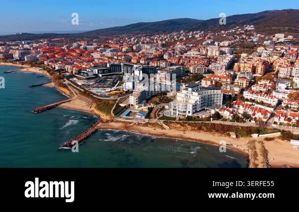 Panoramic aerial of seaside resort city with hotels along coastline ...