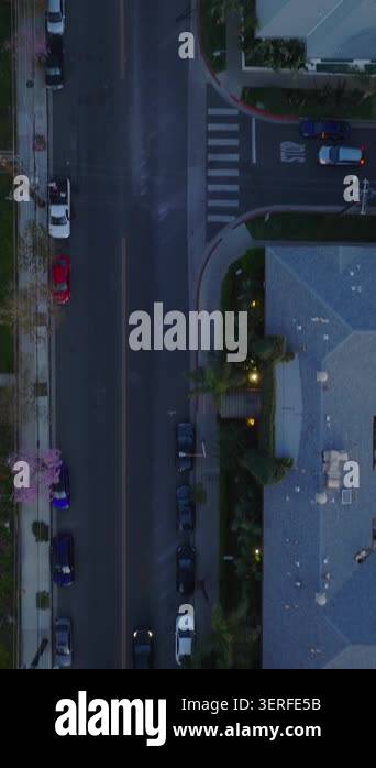 Birds eye shot of side streets in residential urban borough at twilight ...