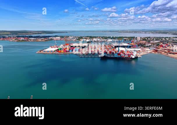 Burgas, Bulgaria, 10 April 2026: Container terminal and docked vessel ...