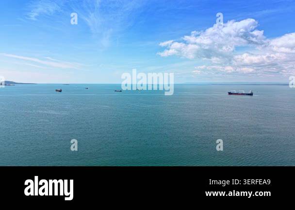 Distant cargo ships on calm Black Sea horizon, Bulgaria. Aerial ...