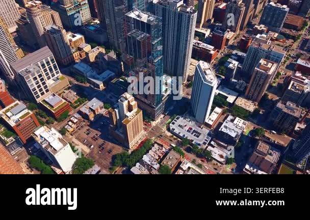 Flight over the building tops in the cityscape of modern metropolis ...