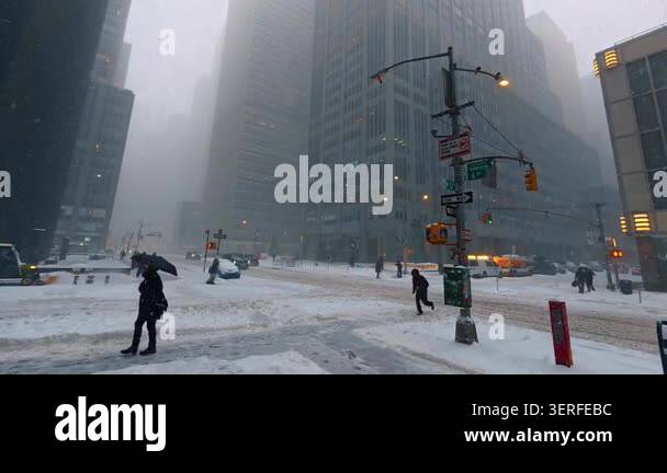 New York, USA, 12 January 2026: Pedestrians crossing Sixth Avenue ...