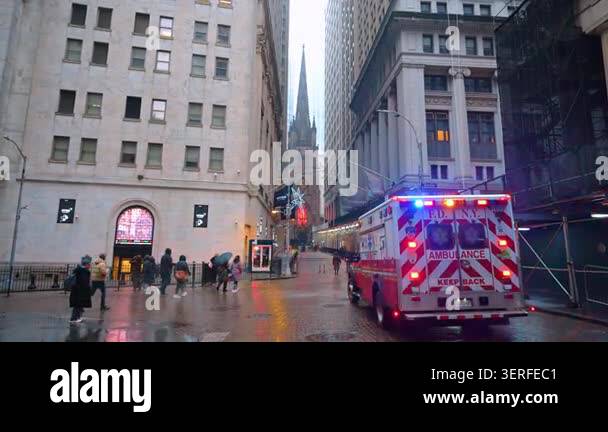 New York, USA, 25 December 2025: FDNY ambulance on wet Wall Street ...