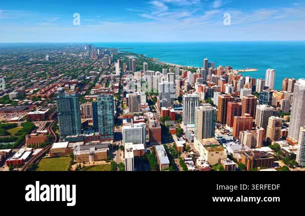 Beautiful cityscape at the waterfront of the blue peaceful waterscape ...