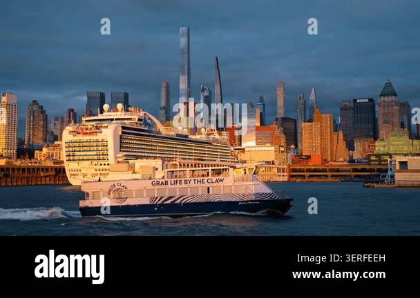 New York, USA, 22 May 2026: Large cruise ship and tour boat on ...