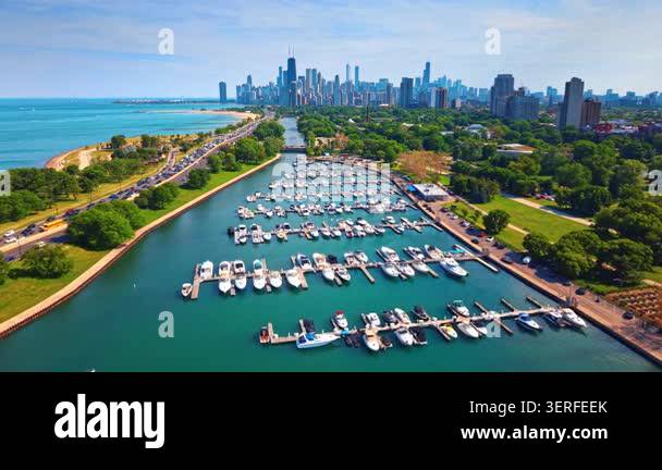 Flight over the vessels at the berths on the blue waterscape. A highway ...