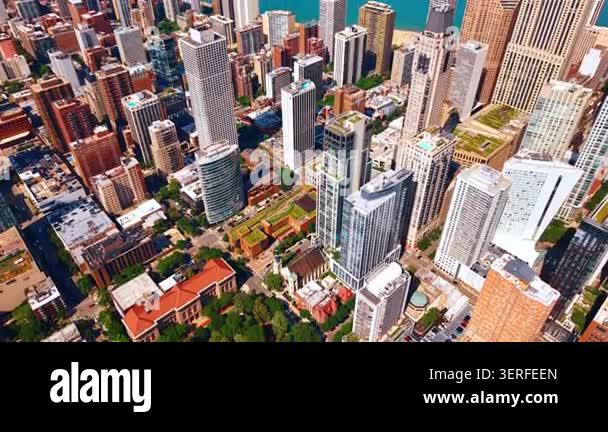High over the rooftops of diverse buildings of modern Chicago, Illinois ...
