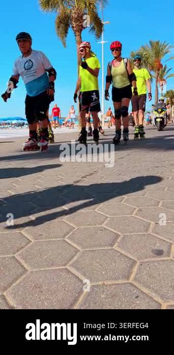 Alicante, Spain, 8 August 2025: Inline skaters rolling on seaside ...