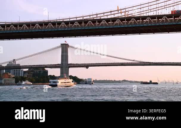 New York, USA, 22 May 2026: Brooklyn Bridge and Manhattan Bridge at ...
