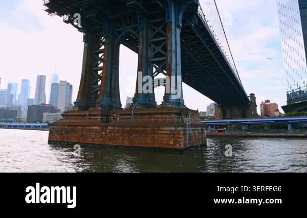 New York, USA, 22 May 2026: Underside of Manhattan Bridge tower and ...