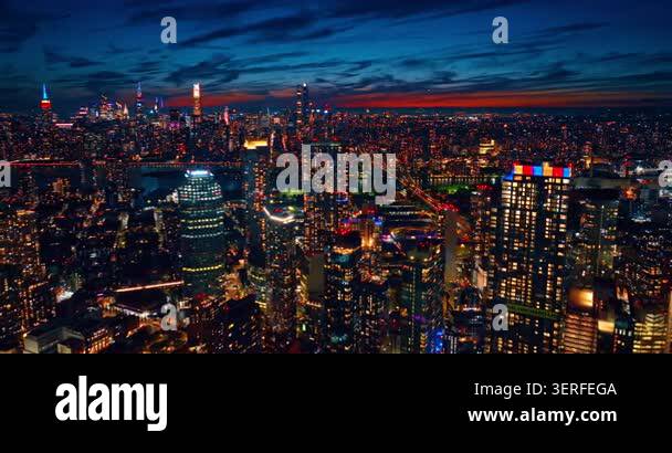 Stunning lights of modern lively metropolis at night. Drone flight ...