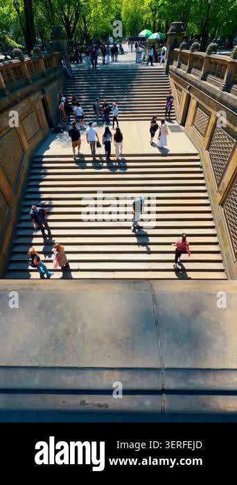 New York, USA, 22 May 2026: People walking on Bethesda Terrace steps in ...