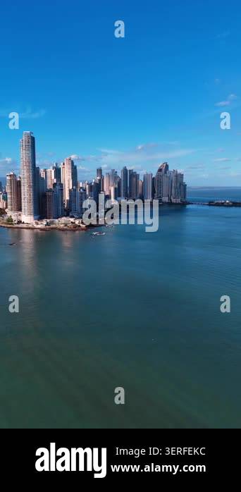 Morning sunlight on Panama City skyscrapers from the waterfront ...