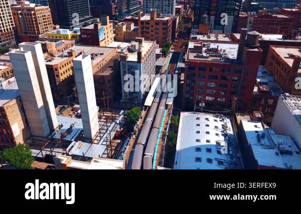 Chicago, USA, 7 May 2026: Elevated train passing through construction ...