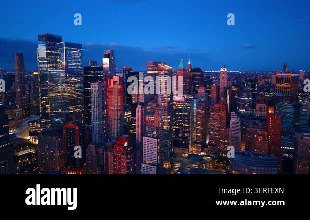 Illuminated Lower Manhattan skyline at twilight New York City. Aerial ...