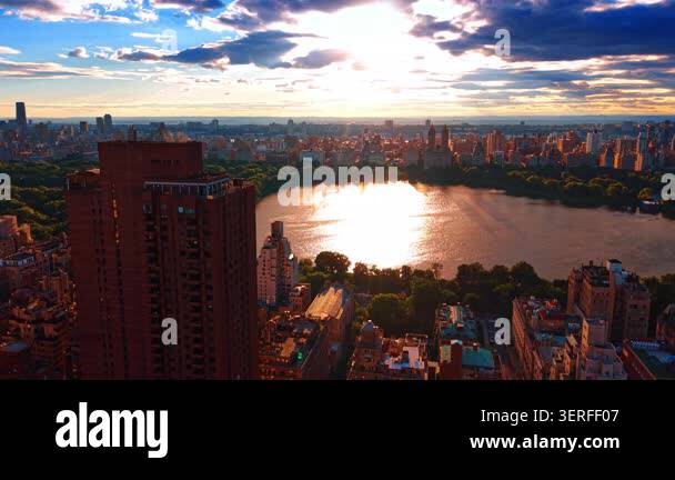 Light of setting sun reflects on the waterscape of the lake in Central ...