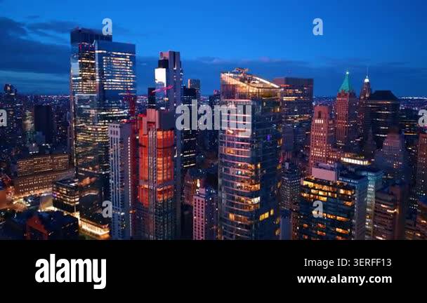 Aerial view of Lower Manhattan skyscrapers under construction at dusk ...