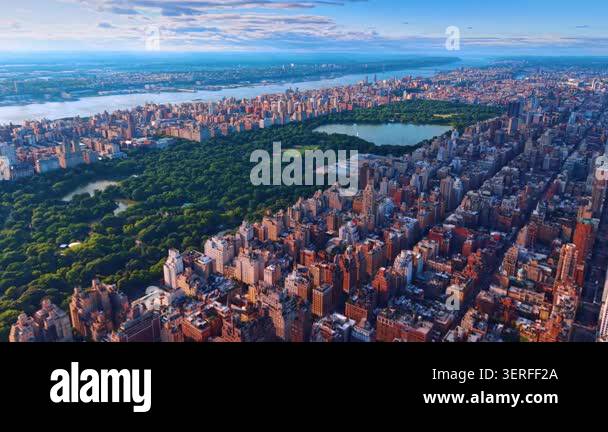 Approaching the lush greenery of Central Park surrounded by high-rise ...