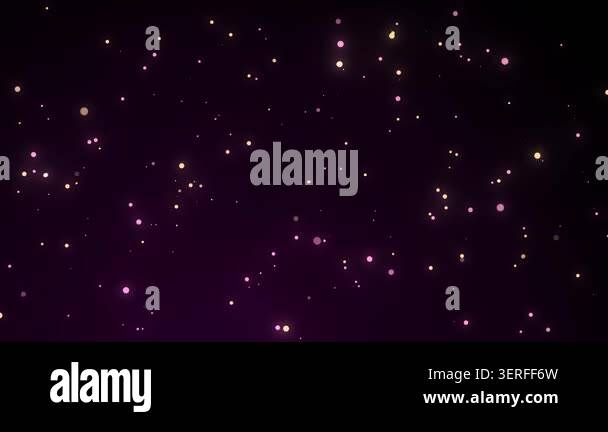 Glowing pink and golden bokeh particles on dark purple background ...