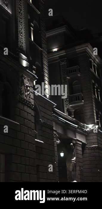 Stone Balcony Detail On Illuminated Facade, Snow Dusting On Balustrade ...