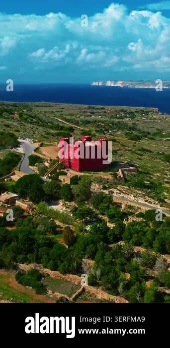 Aerial view of Saint Agathas Tower, Red Tower in Malta Stock Video ...