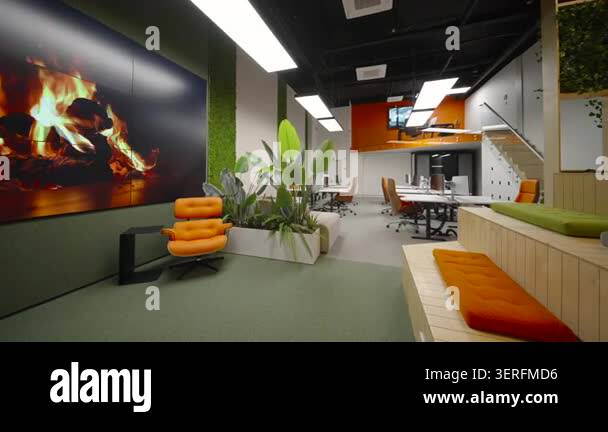 Contemporary open office interior with a lounge area, potted plants ...