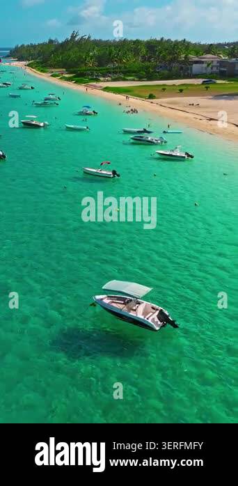 Aerial view of beach with palm trees and perfect turquoise sea water ...