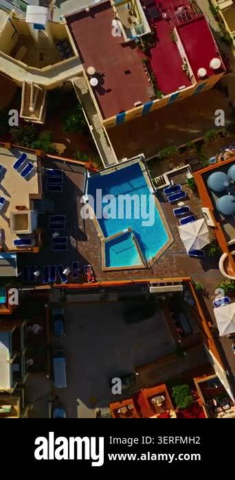 Aerial view of tourist apartments with a swimming pool on the island of ...