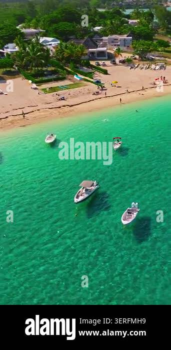 Aerial view of beach with palm trees and perfect turquoise sea water ...
