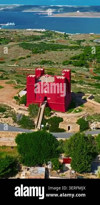 Aerial view of Saint Agathas Tower, Red Tower in Malta Stock Video ...