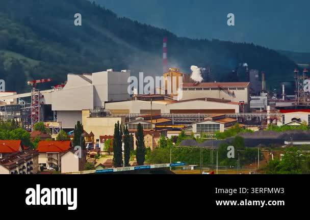 Aerial view of beautiful industrial town of Leoben in the mountains in ...