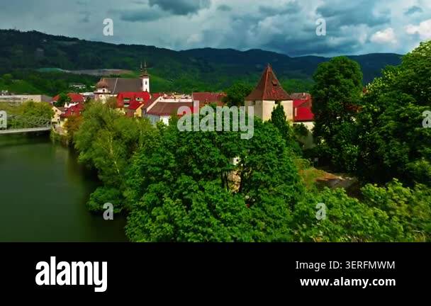 Aerial view of beautiful industrial town of Leoben in the mountains in ...