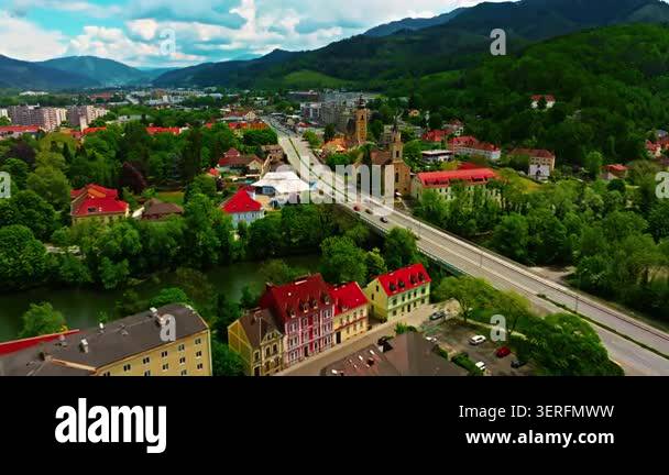 Aerial view of beautiful industrial town of Leoben in the mountains in ...