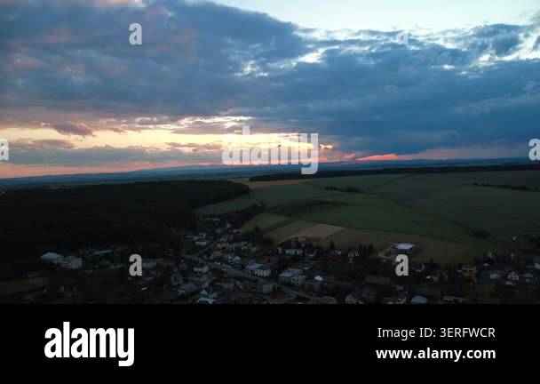 Aerial drone view of massive storm clouds moving across the landscape ...