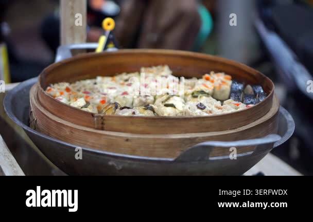 Delicious street food culinary serving assorted steamed dim sum with ...