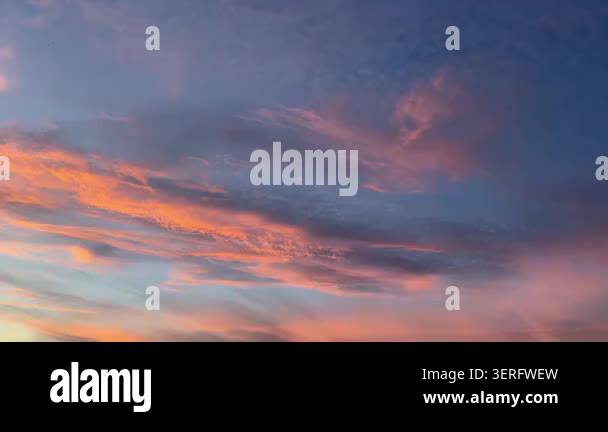 Soft pastel sunset sky with pink clouds and tranquil atmospheric ...