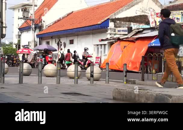 Yogyakarta, Indonesia - June 4, 2026,Vehicle traffic passing through ...