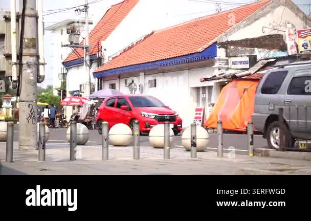 Yogyakarta, Indonesia - June 4, 2026,Vehicle traffic passing through ...
