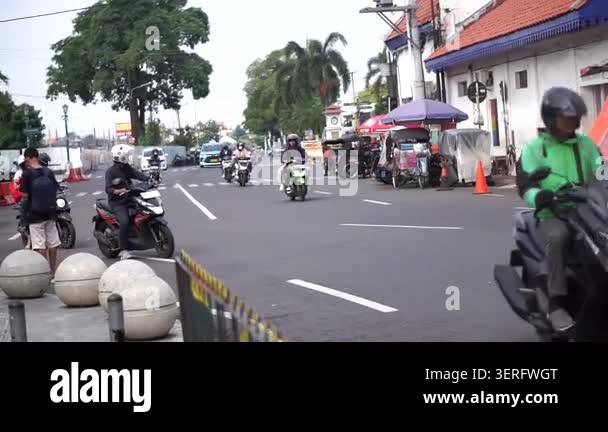 Yogyakarta, Indonesia - June 4, 2026,Vehicle traffic passing through ...