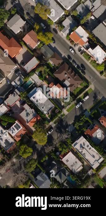 Top down footage of dense town development in residential urban borough ...