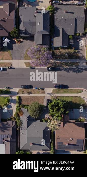 Top down flight over Los Angeles residential neighborhood showing homes ...