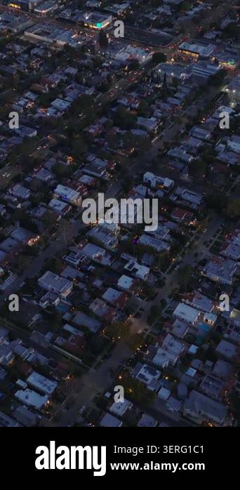 Row of houses along streets in residential urban neighbourhood from ...